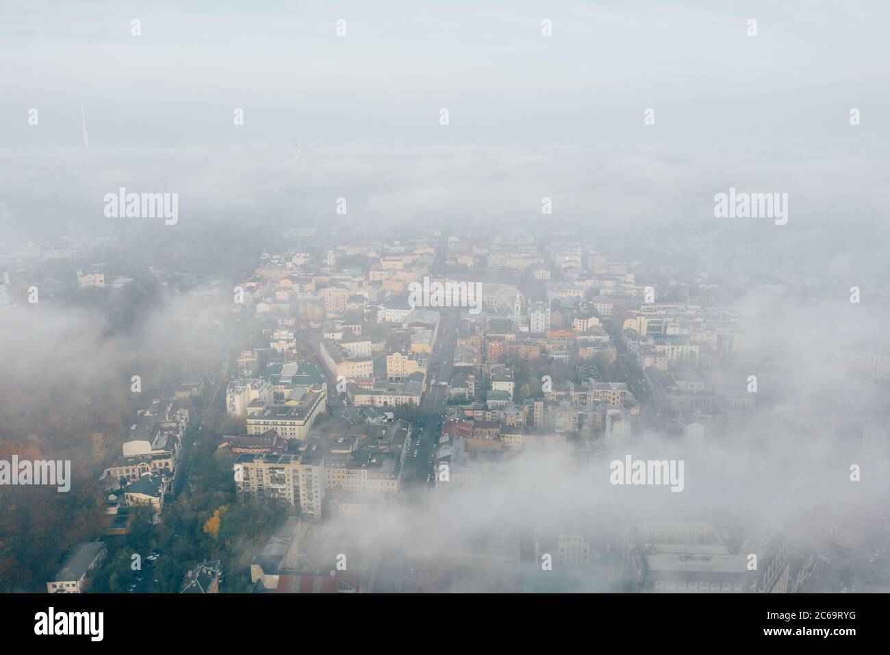 Aerial view of the city in the fog Stock Photo - Alamy