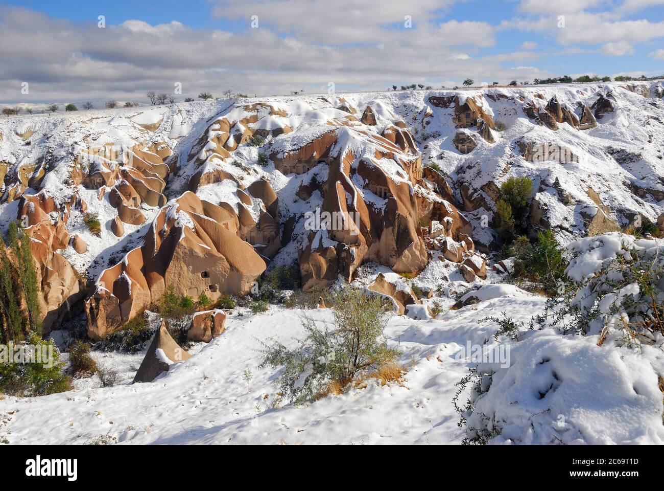 View of Cappadocia. Turkey. Unusual winter landscape with cliff at ...
