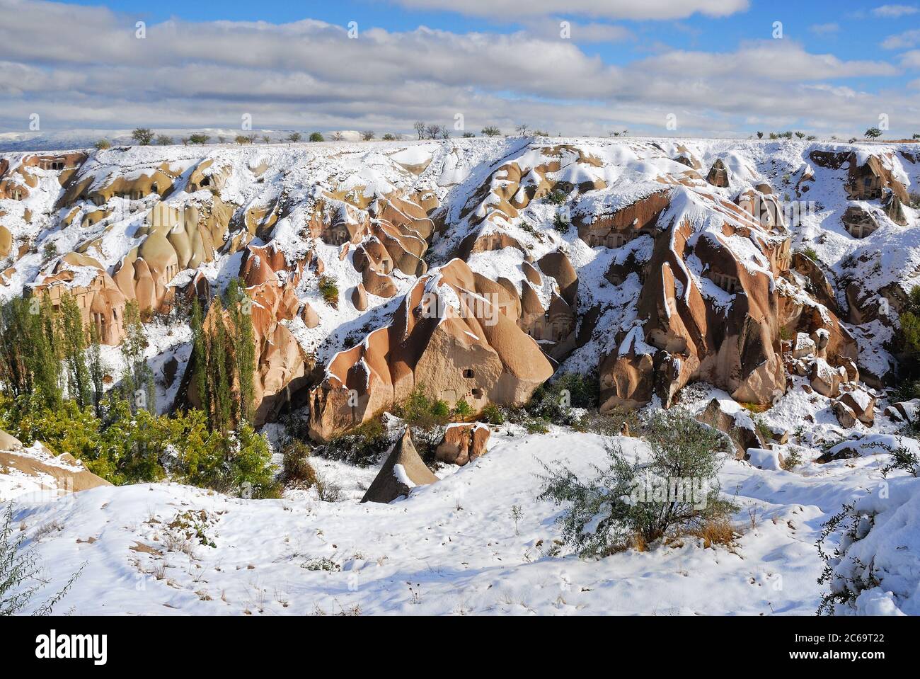 View of Cappadocia. Turkey. Unusual winter landscape with cliff at ...