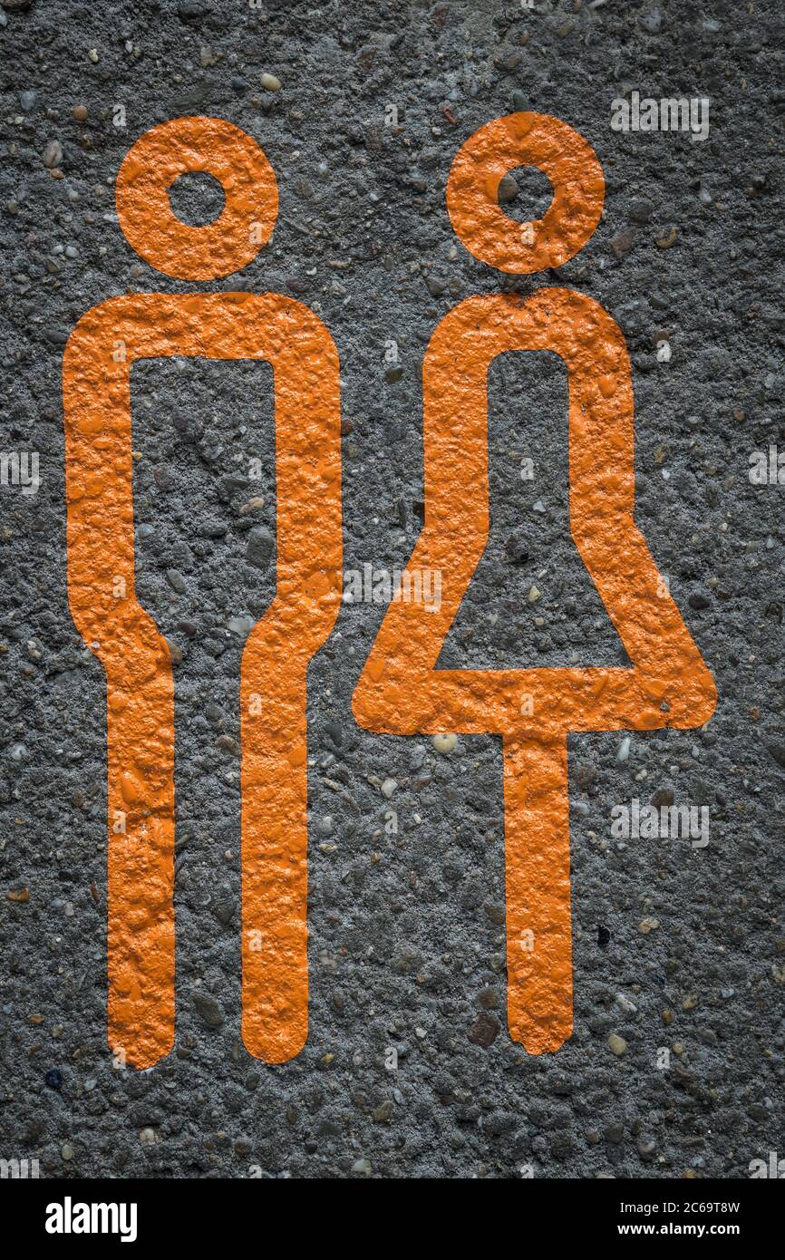 toilet sign on the ground of a public building Stock Photo - Alamy