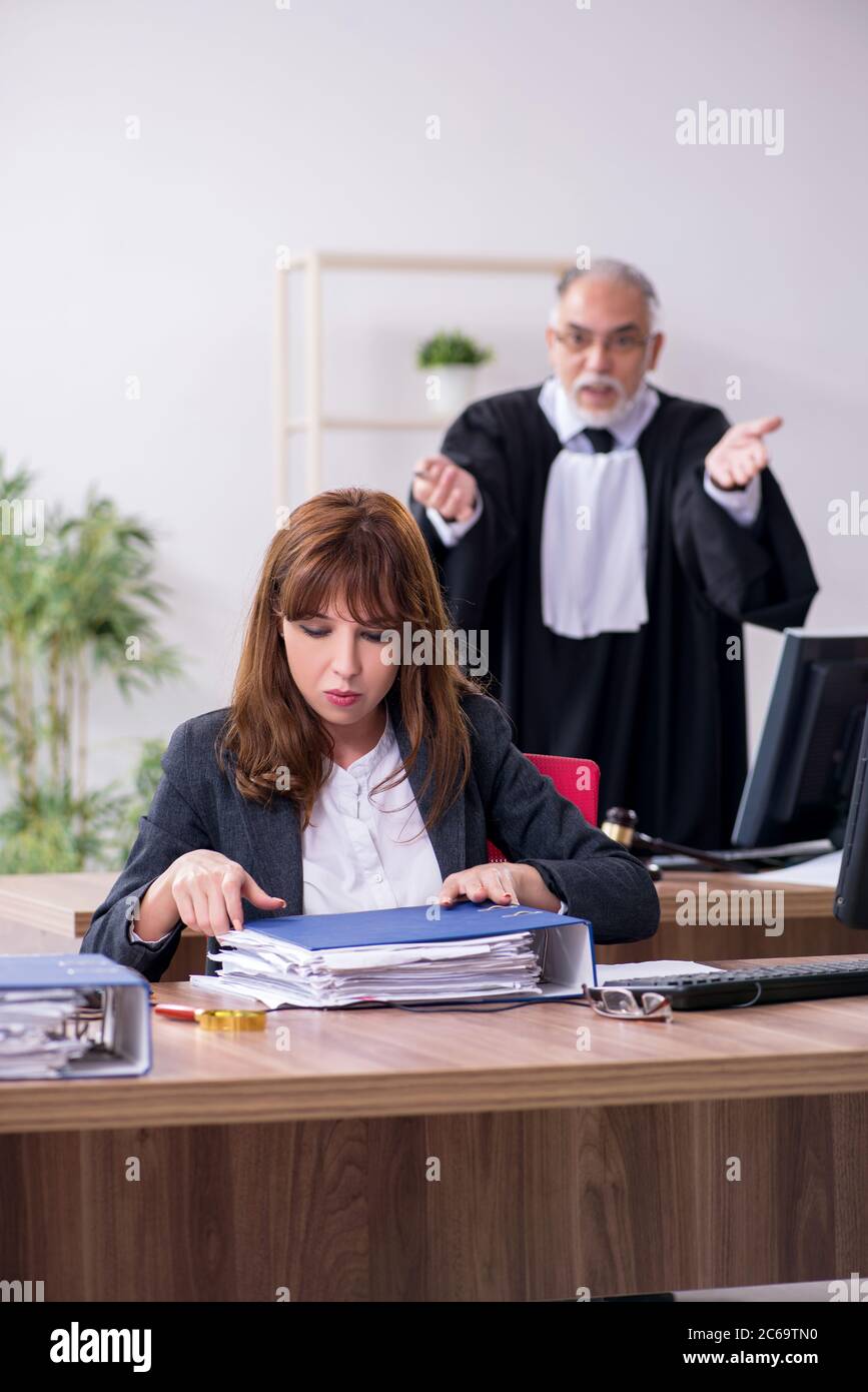 Old judge and his young secretary in the office Stock Photo - Alamy