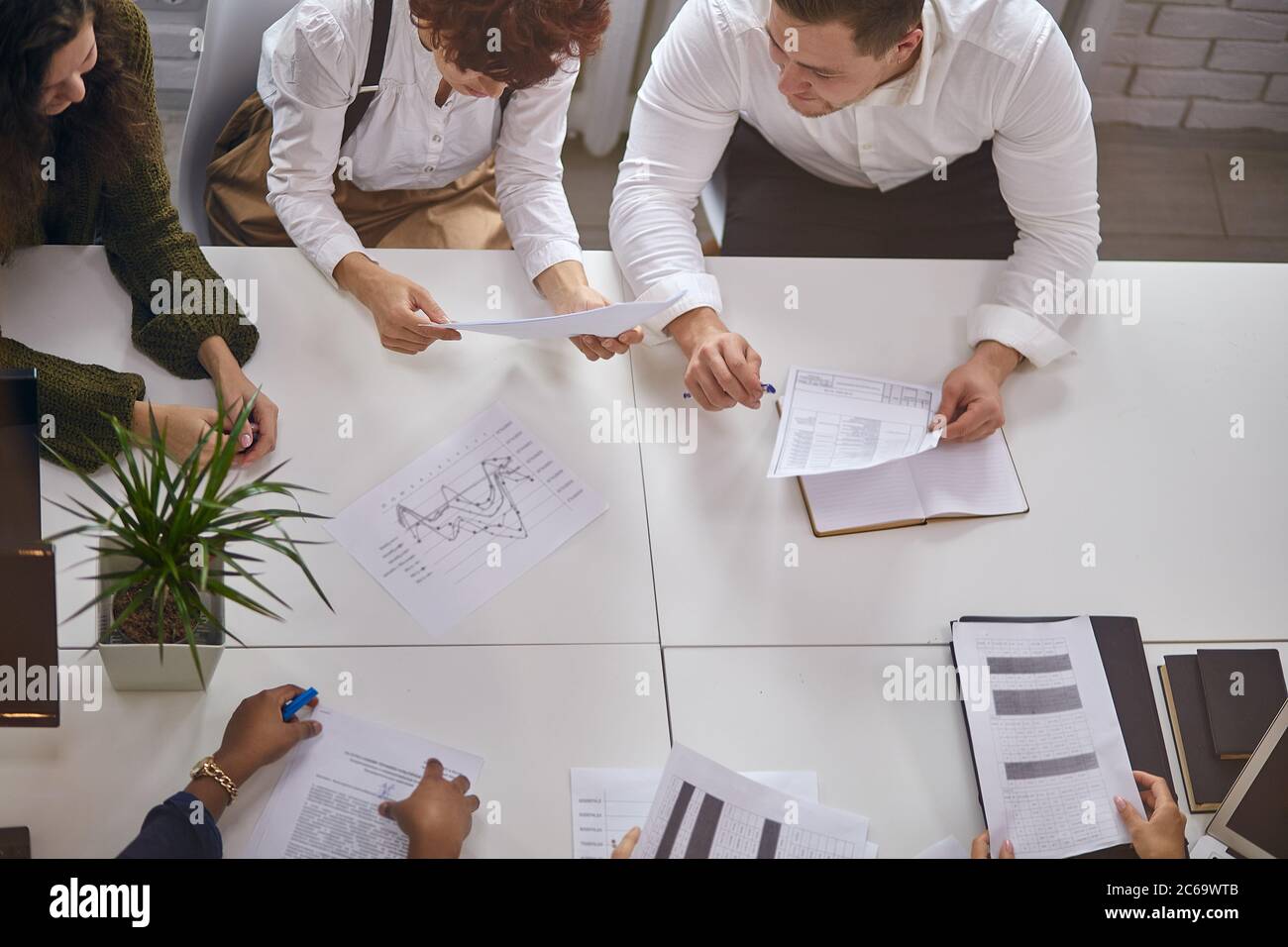 Top view on process of working business people, business meeting ...