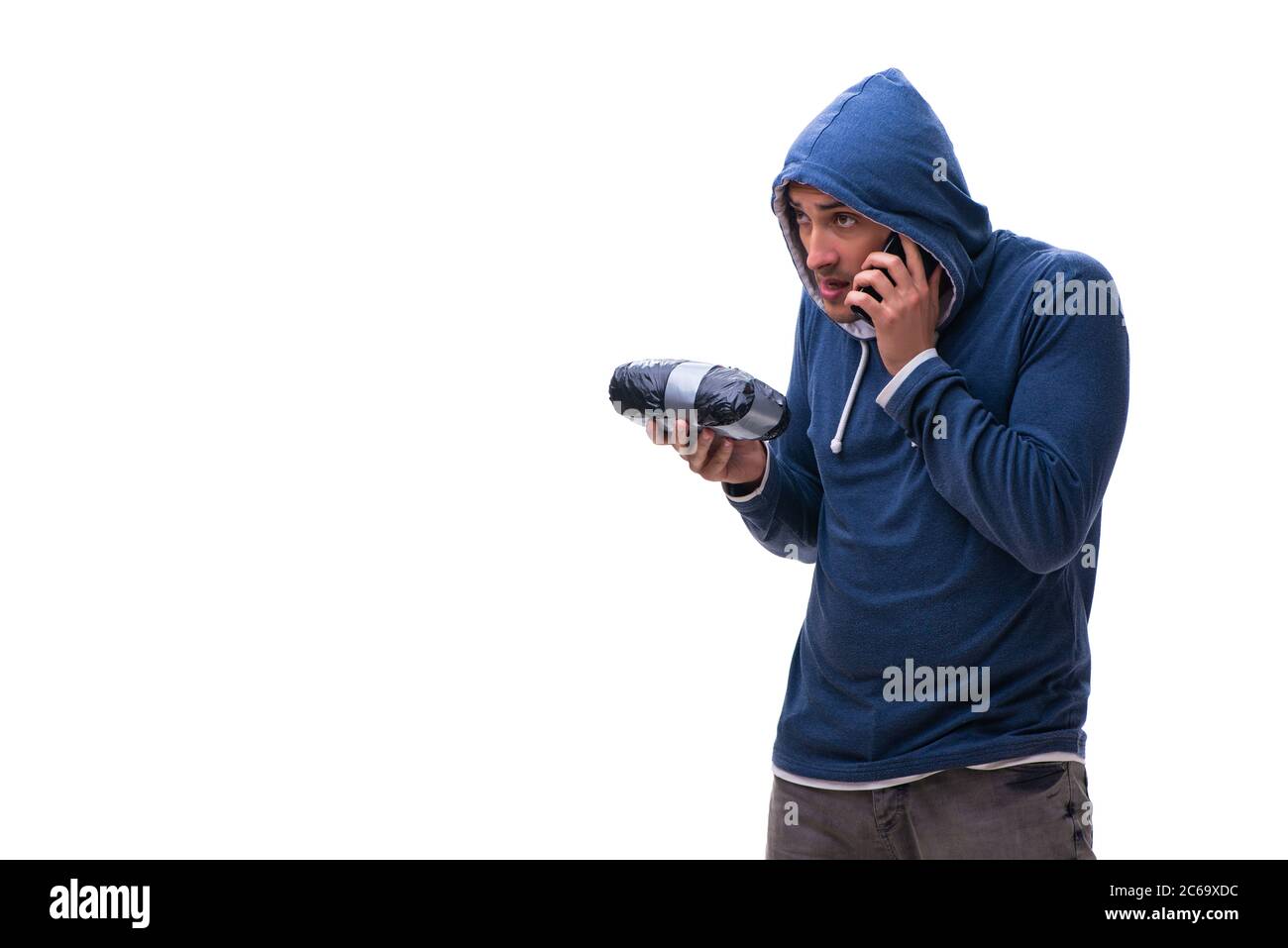 Young drug courier isolated on white background Stock Photo - Alamy