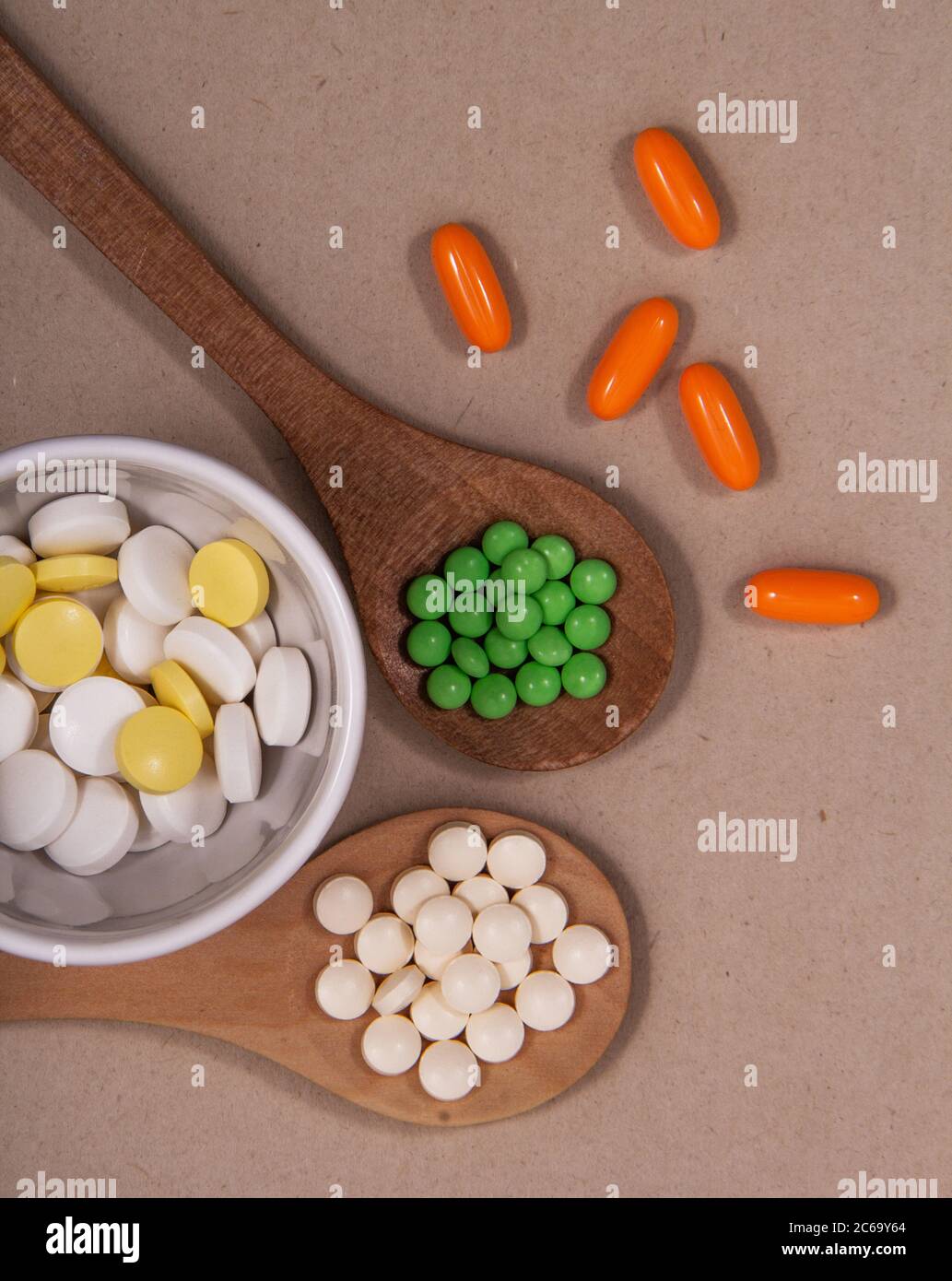 Colored tablets and capsules are removed from the package. Colored ...