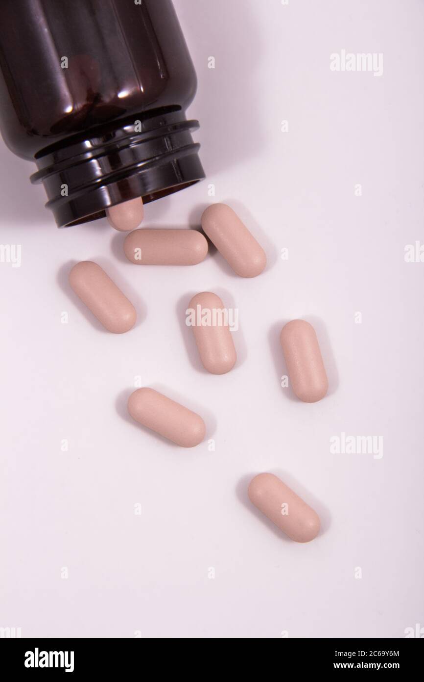 Color capsules out of cover. Color capsules with a simple background ...