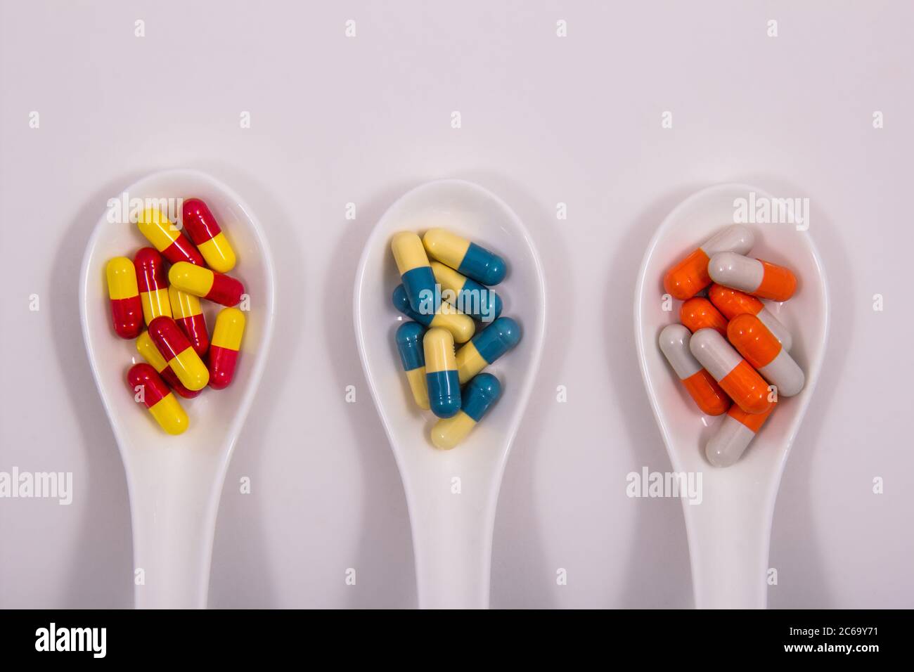 Color capsules out of cover. Color capsules with a simple background ...