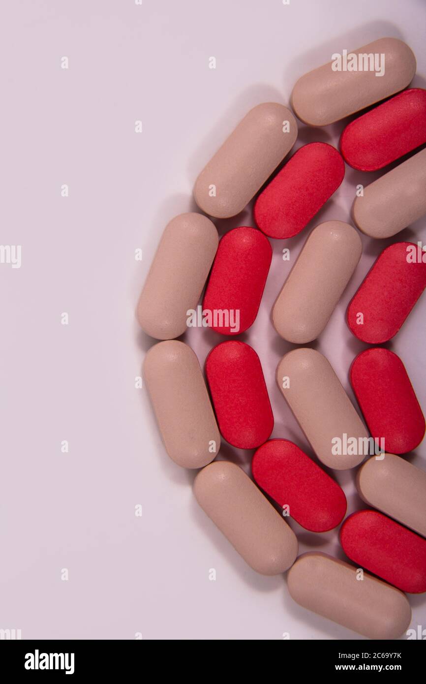 Color capsules out of cover. Color capsules with a simple background ...