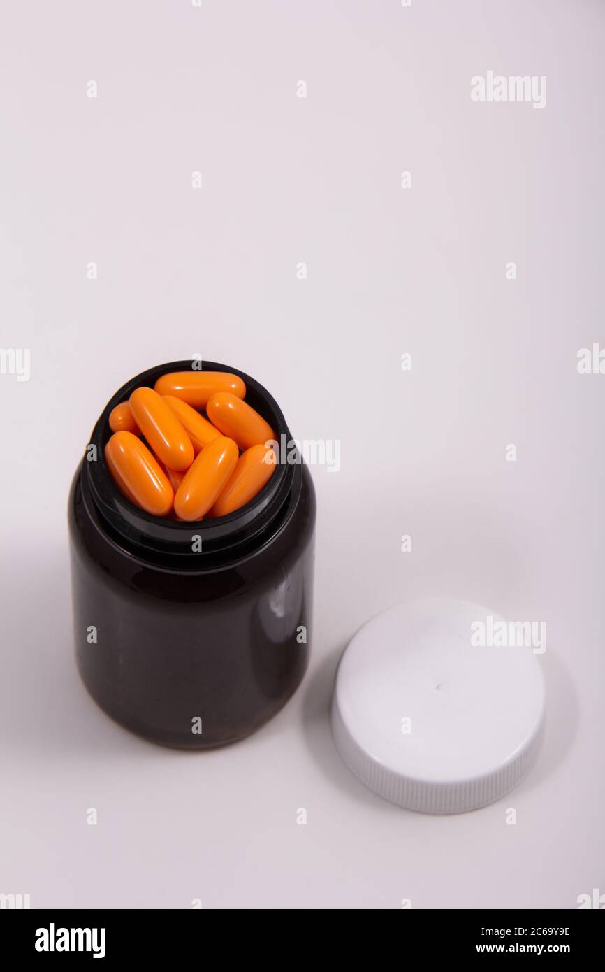 Color capsules out of cover. Color capsules with a simple background ...