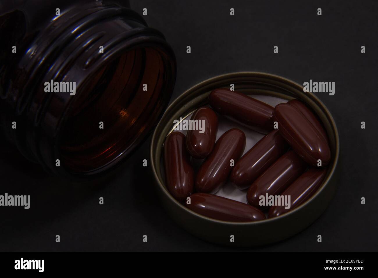 Color capsules out of cover. Color capsules with a simple background ...