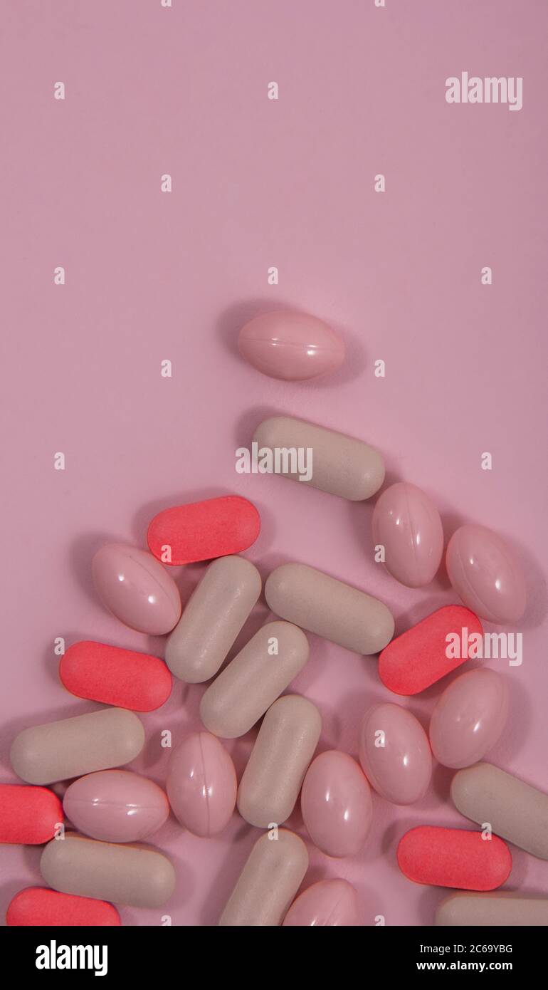 Color capsules out of cover. Color capsules with a simple background ...