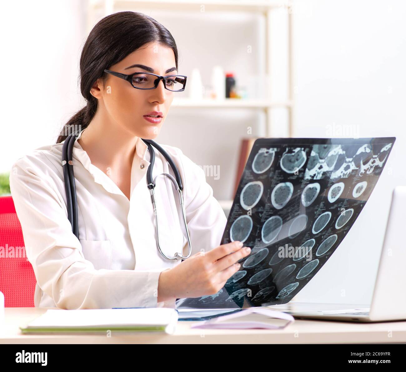 The female doctor radiologist with x-ray can image Stock Photo - Alamy