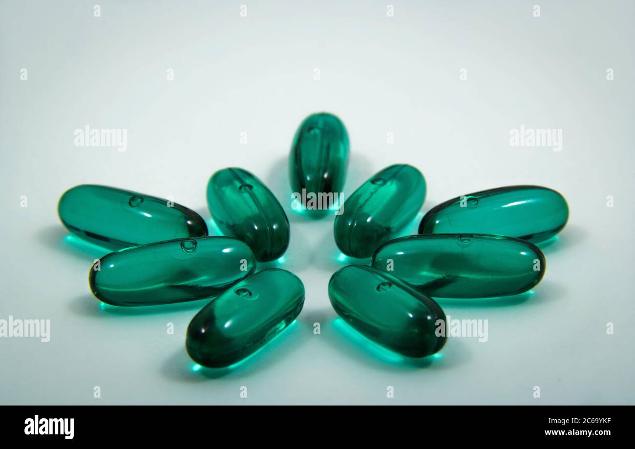 Color capsules out of cover. Color capsules with a simple background ...