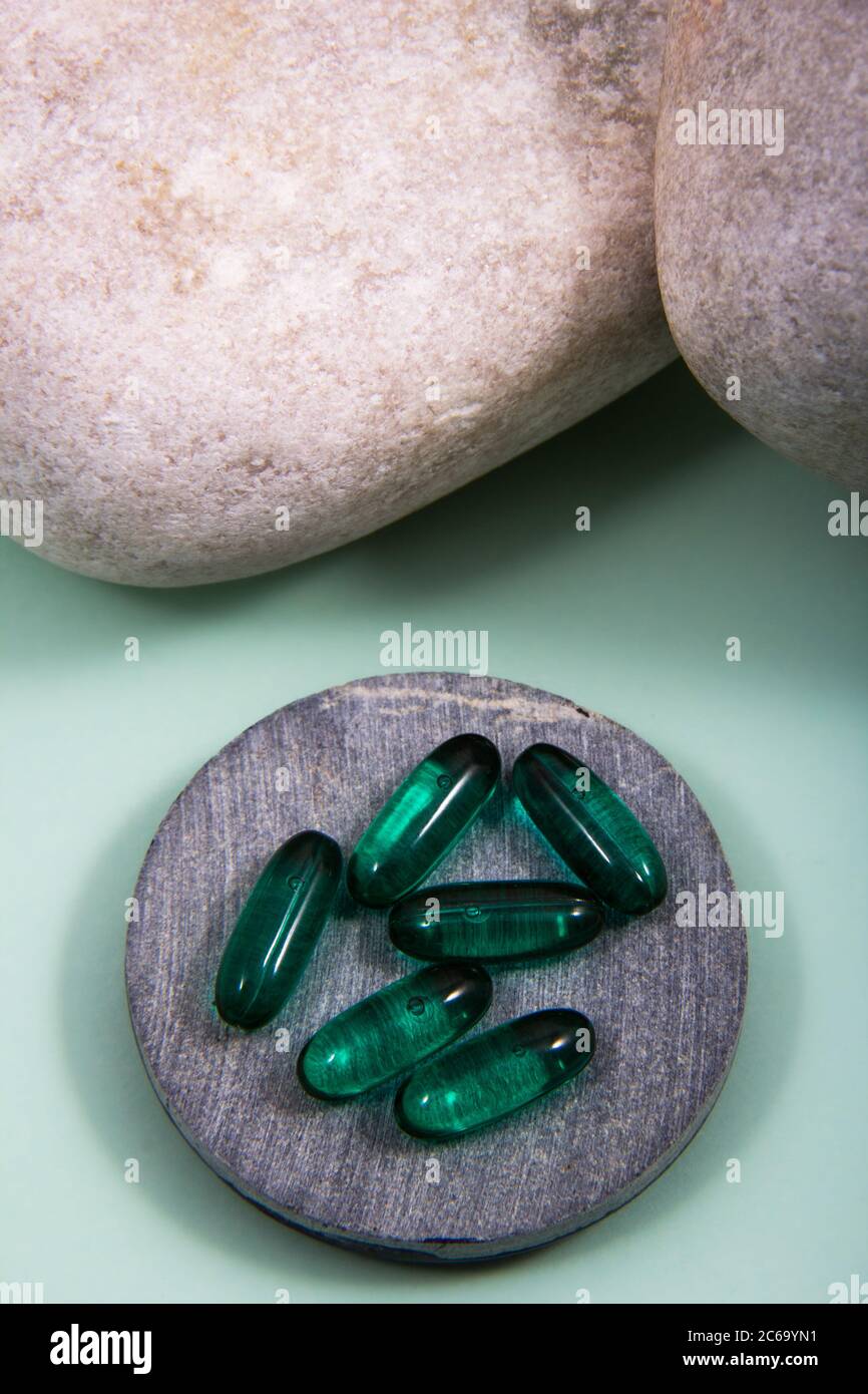 Color capsules out of cover. Color capsules with a simple background ...