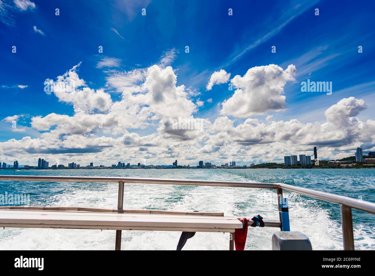 Water blue ocean splash and boat in the sea way ,Waves splashing on the ...