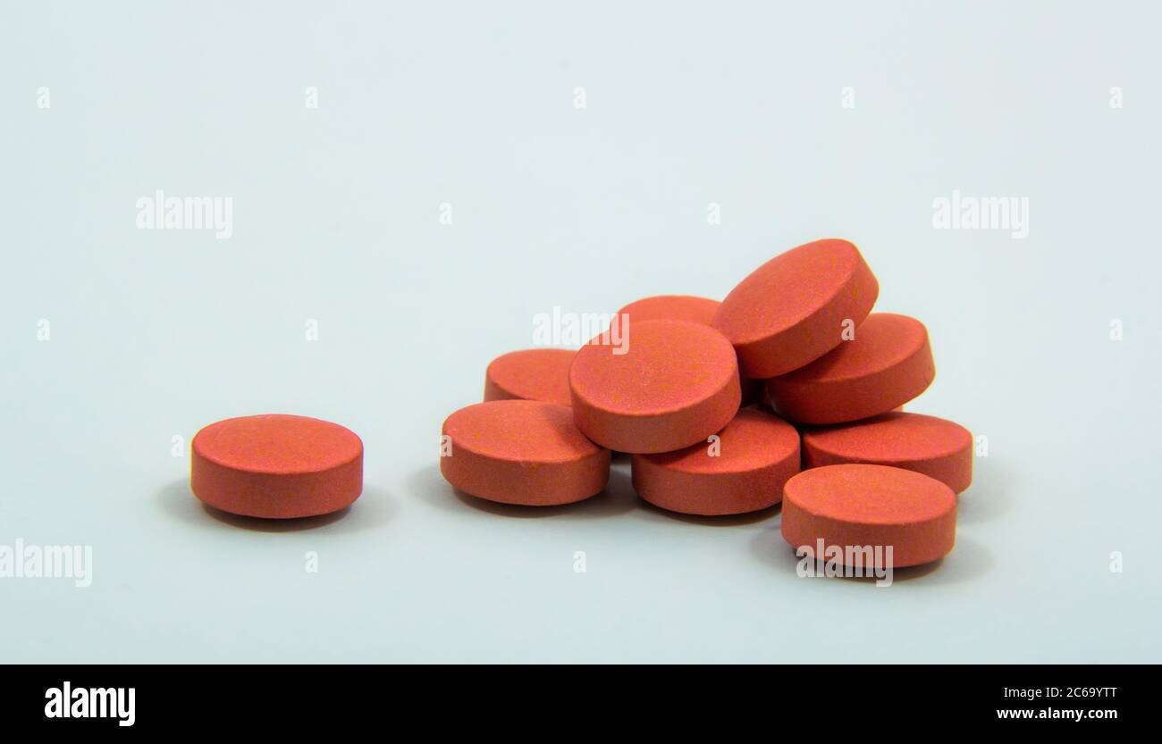 Orange tablets together from the top view. Out-of-package orange ...