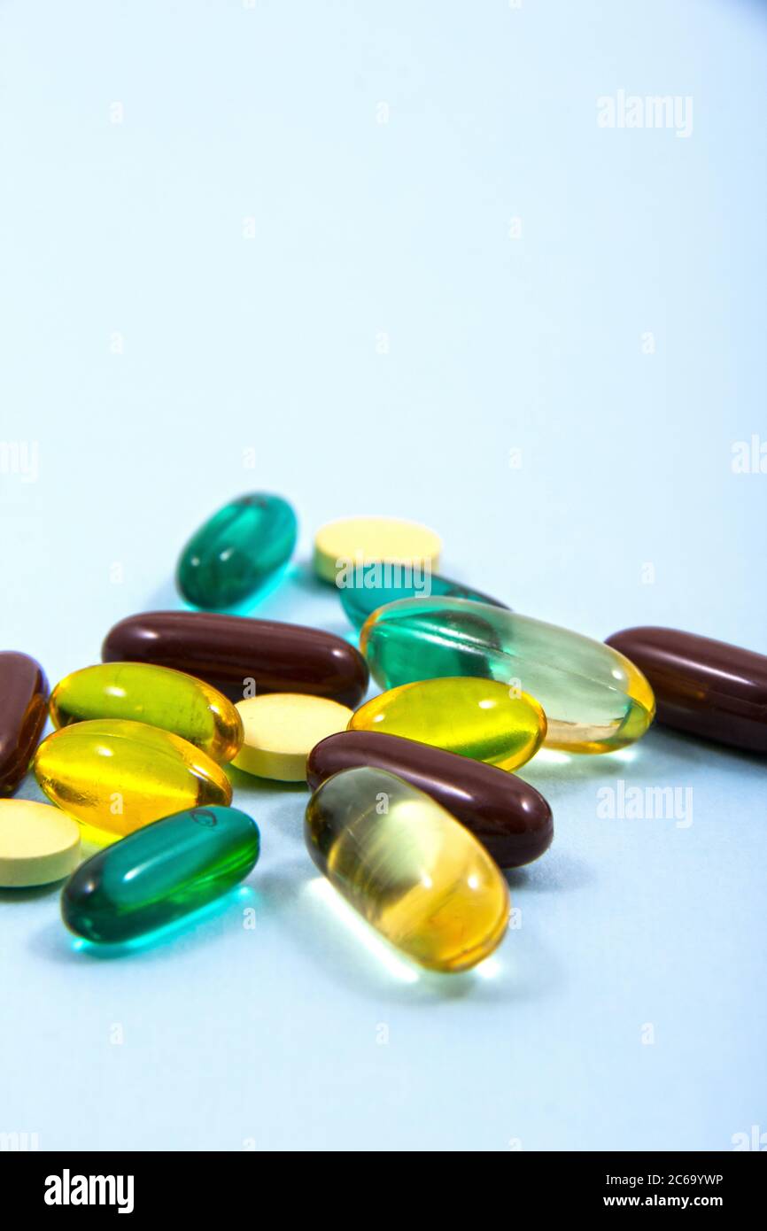 Color capsules out of cover. Color capsules with a simple background ...