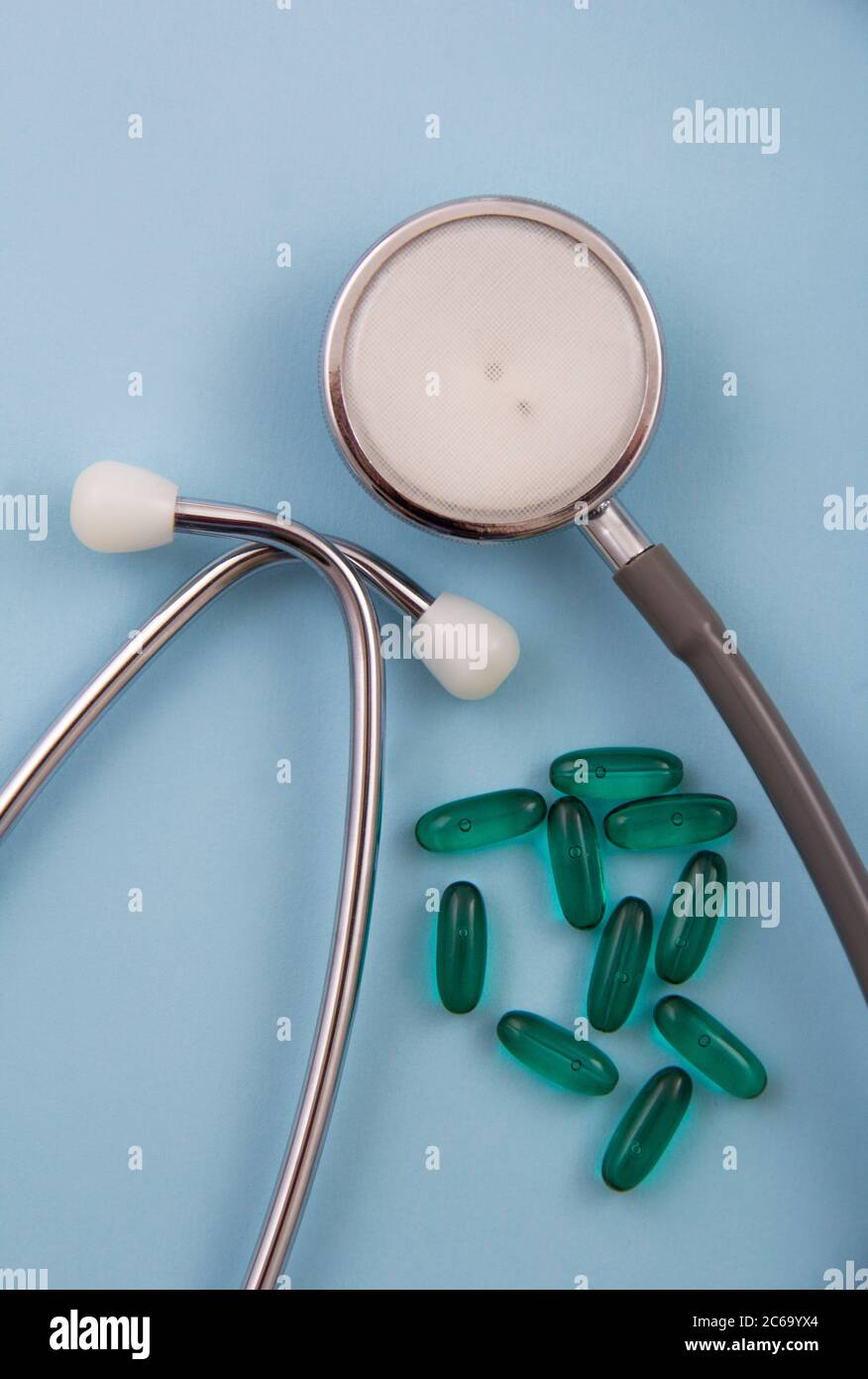 Colored tablets and capsules out of the package. Colored tablets and ...