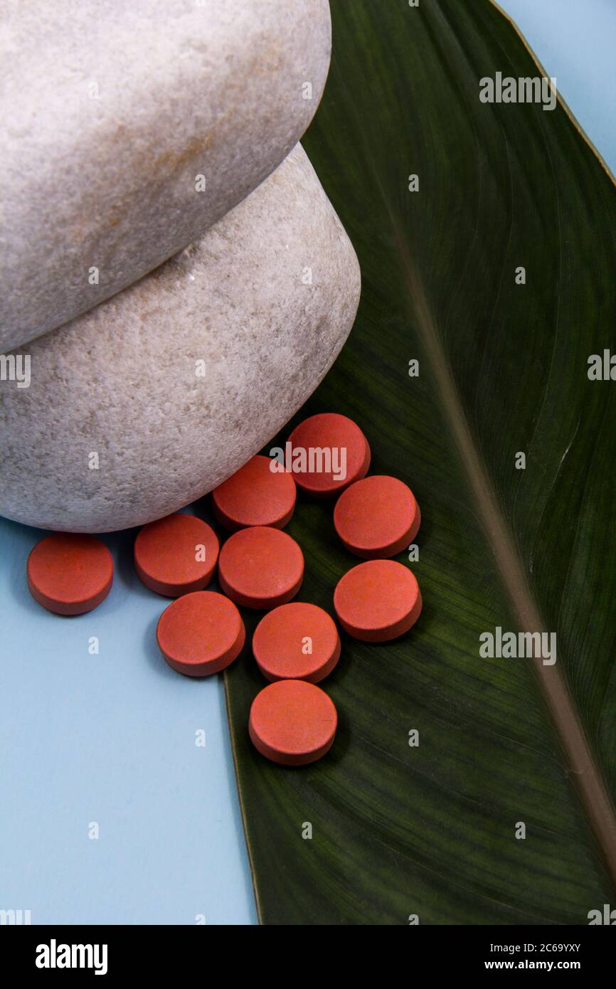 Orange tablets together from the top view. Out-of-package orange ...