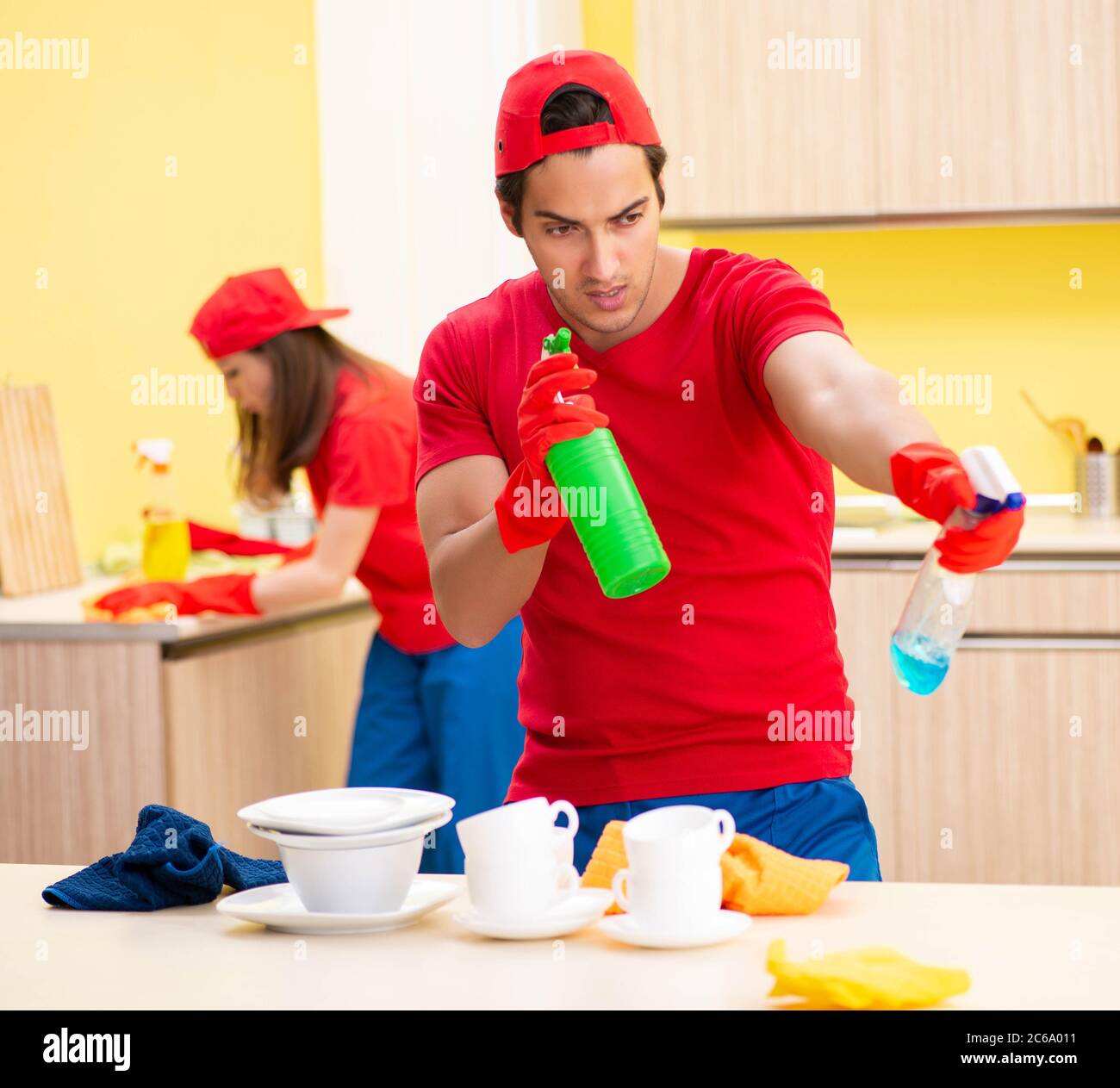 The cleaning professional contractors working at kitchen Stock Photo ...