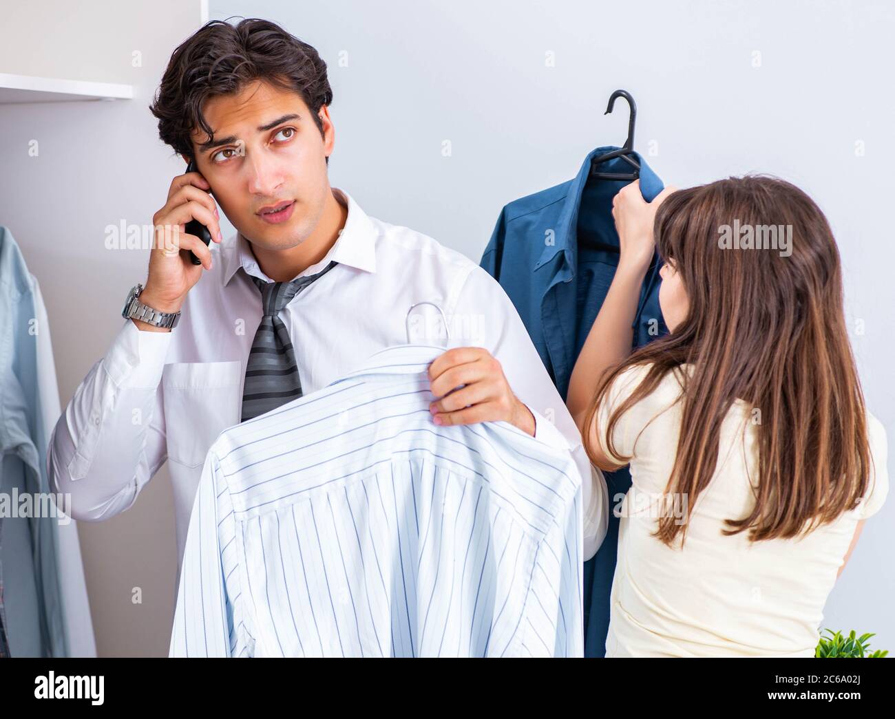 The woman sees her husband off to work Stock Photo - Alamy