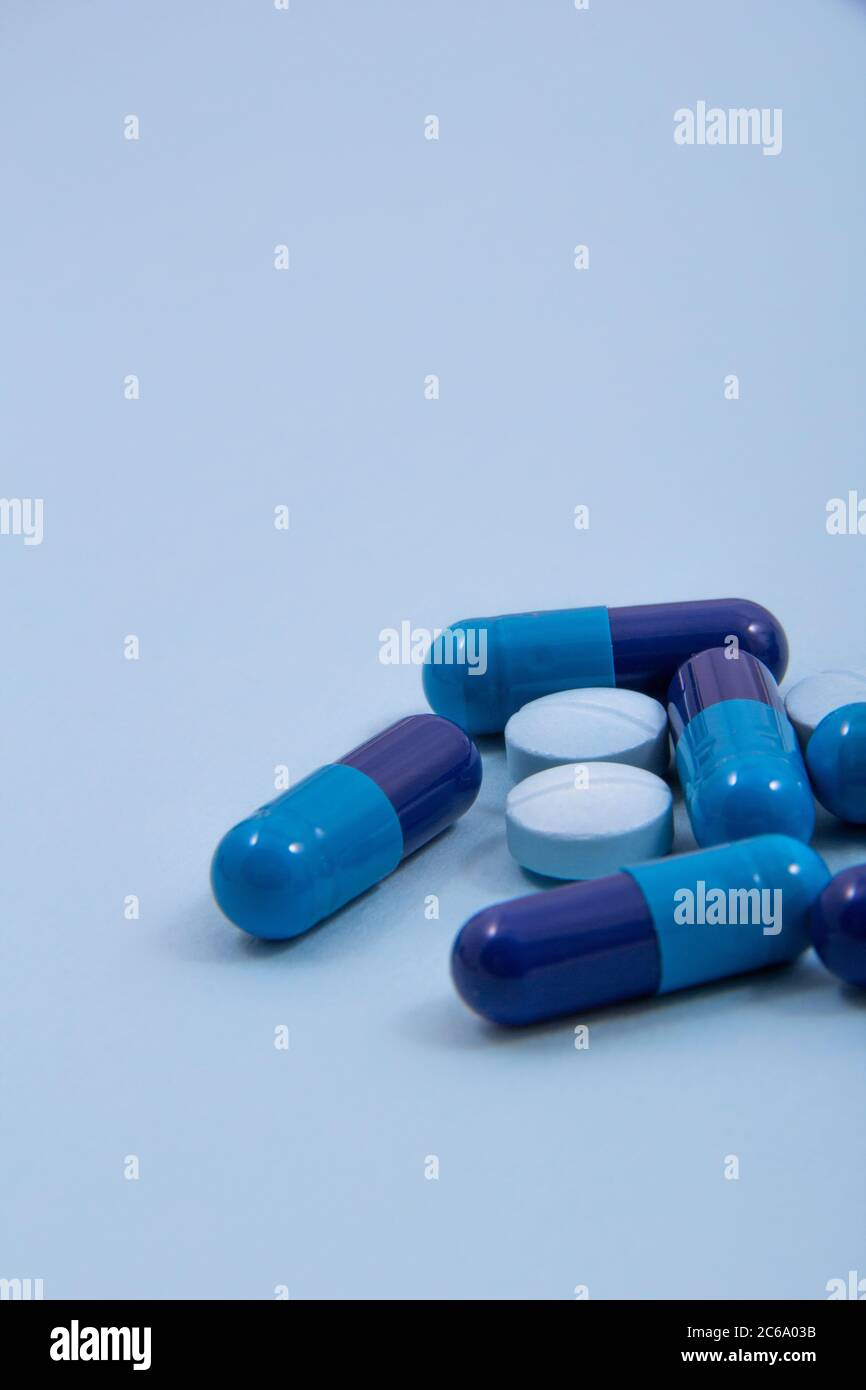 Colored tablets and capsules are removed from the package. Colored ...