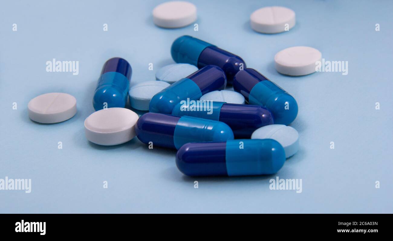 Colored tablets and capsules are removed from the package. Colored ...