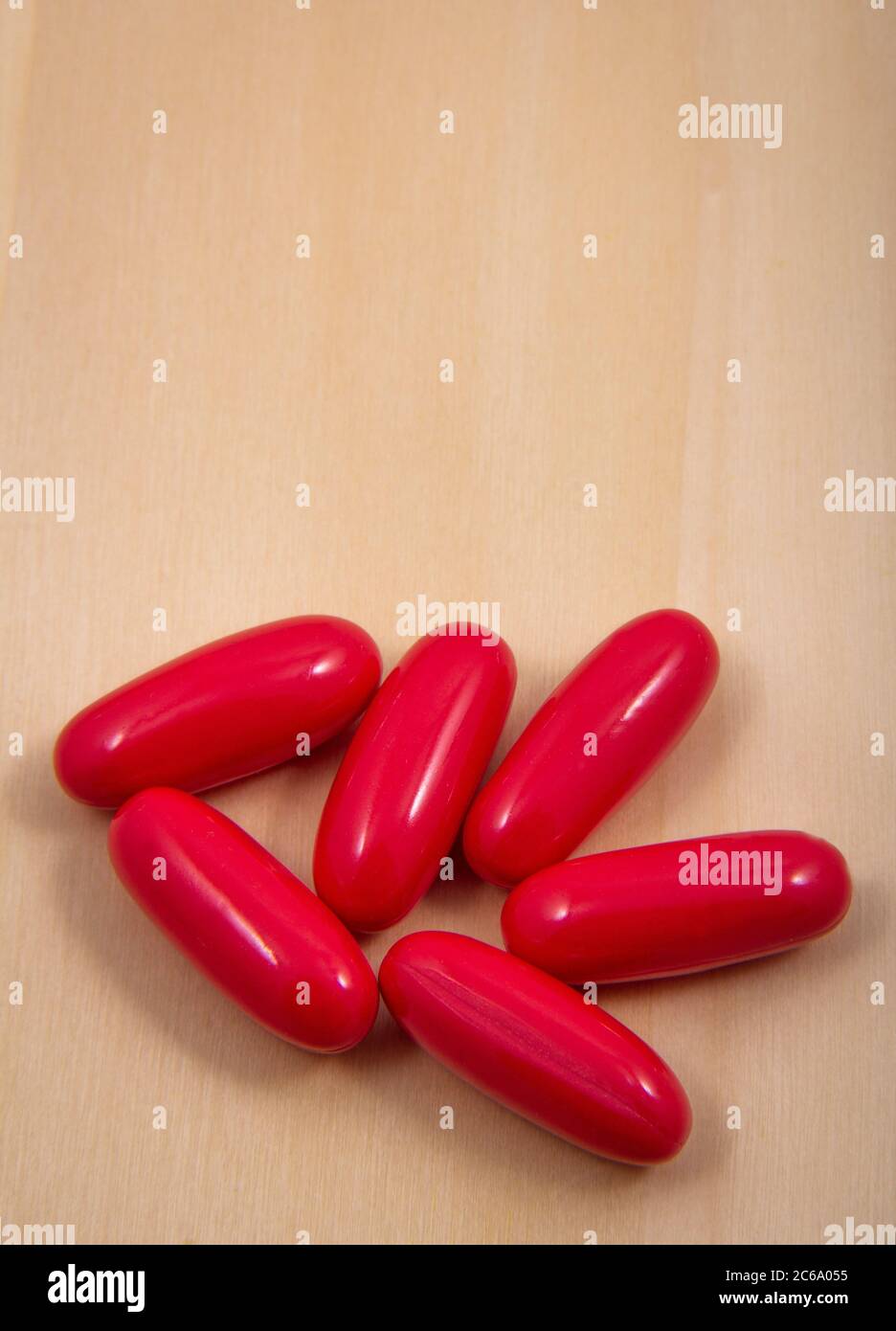 Color capsules out of cover. Color capsules with a simple background ...