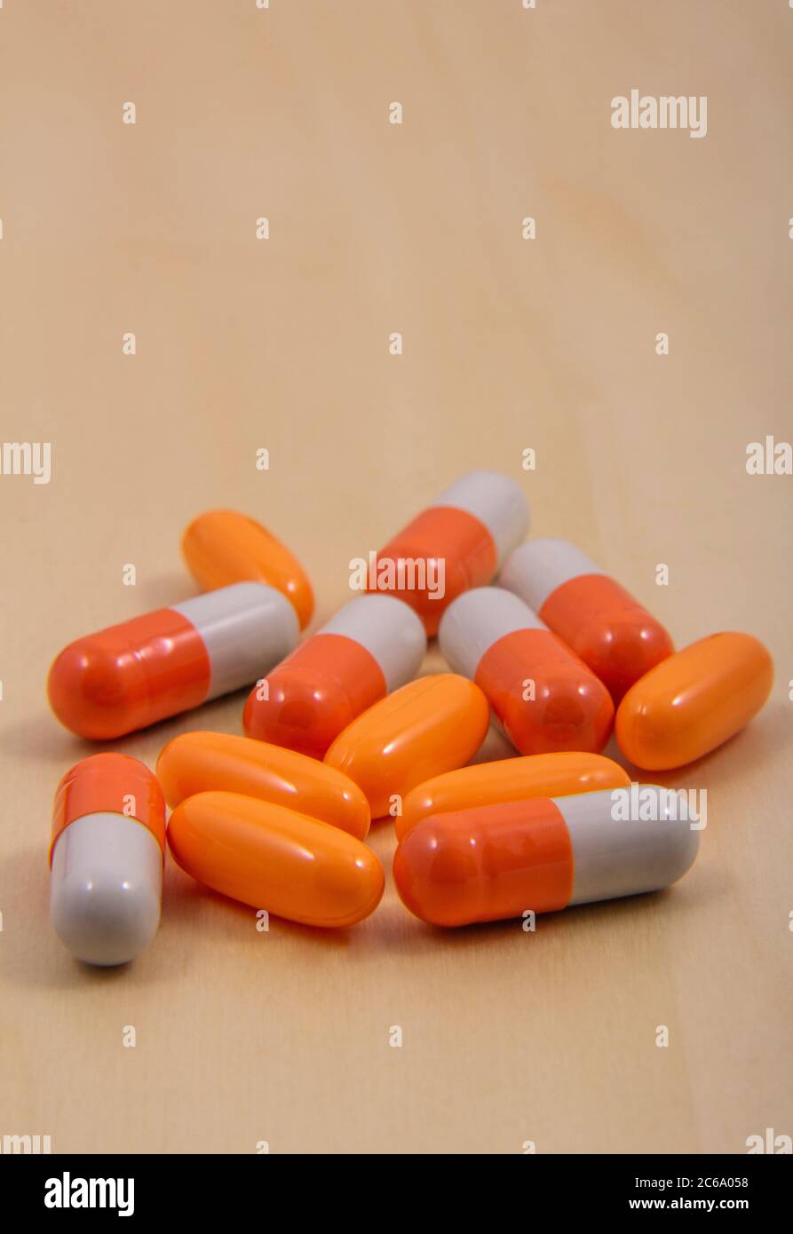 Color capsules out of cover. Color capsules with a simple background ...