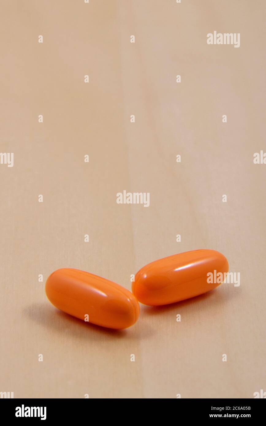 Color capsules out of cover. Color capsules with a simple background ...