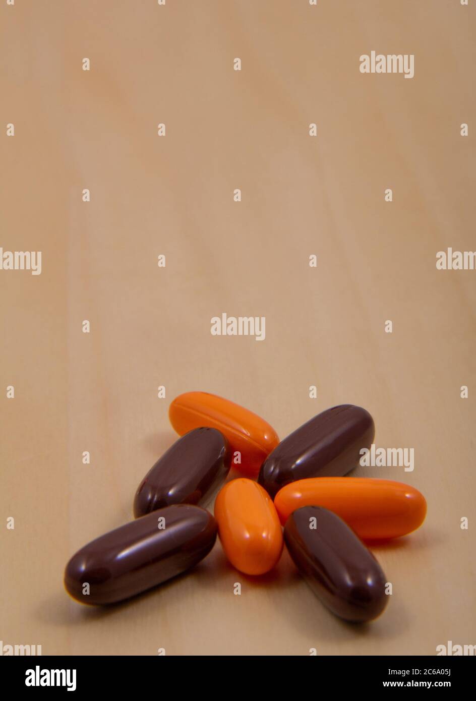 Color capsules out of cover. Color capsules with a simple background ...