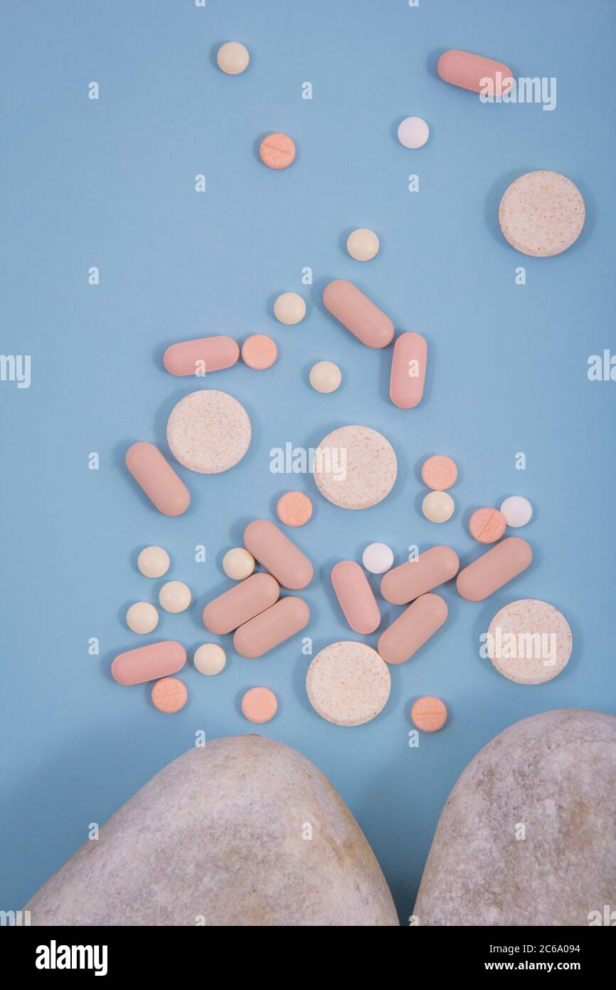 Colored tablets and capsules are removed from the package. Colored ...