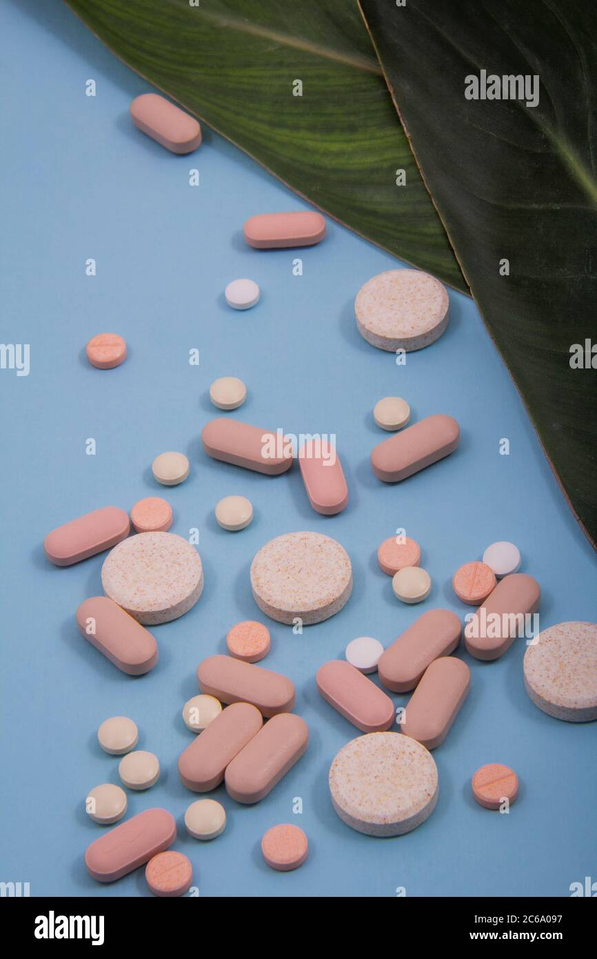 Colored tablets and capsules are removed from the package. Colored ...