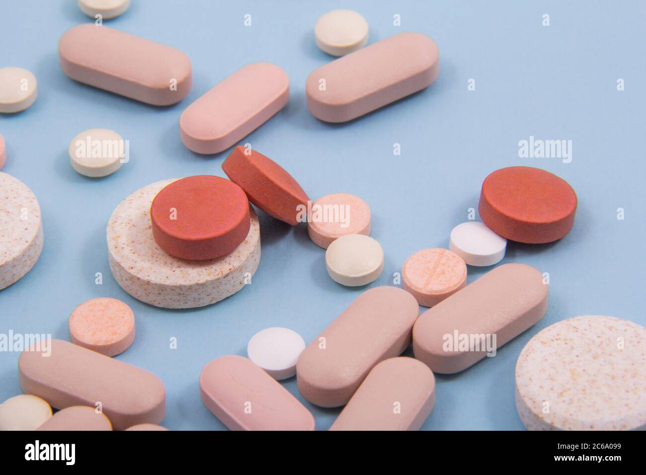 Colored tablets and capsules are removed from the package. Colored ...