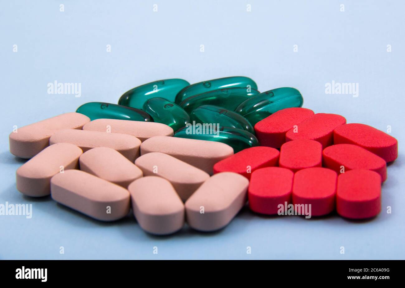 Color capsules out of cover. Color capsules with a simple background ...