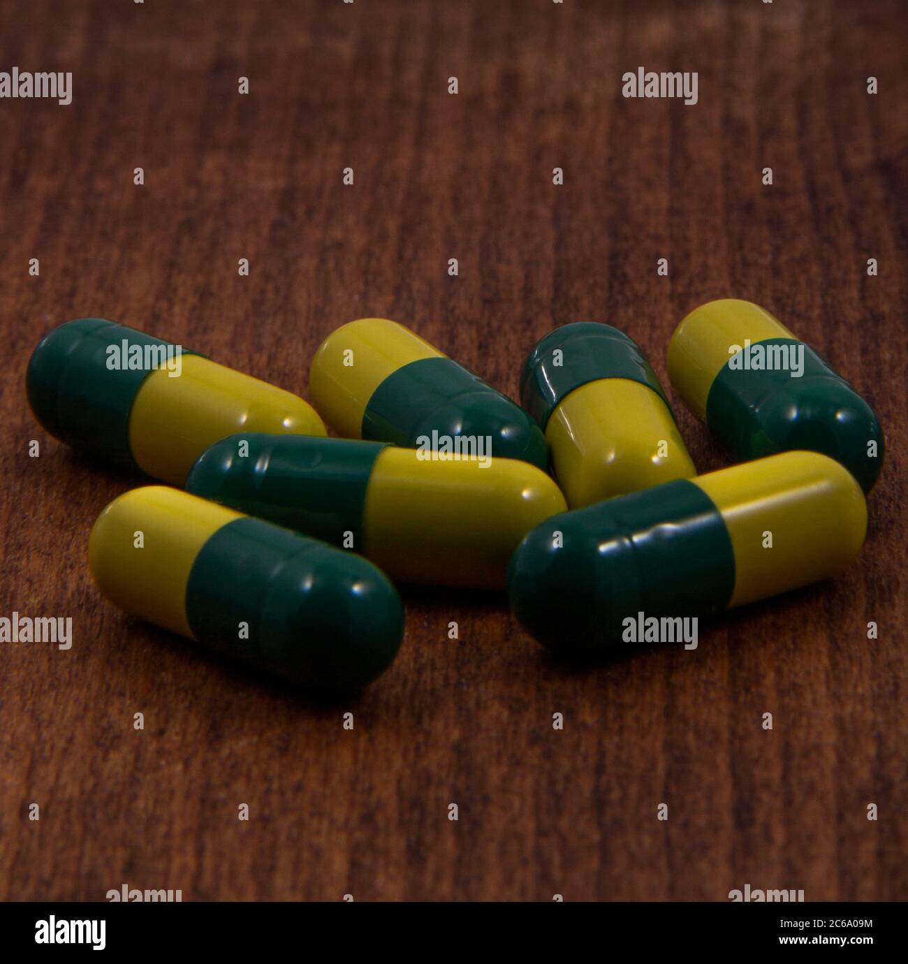 Color capsules out of cover. Color capsules with a simple background ...