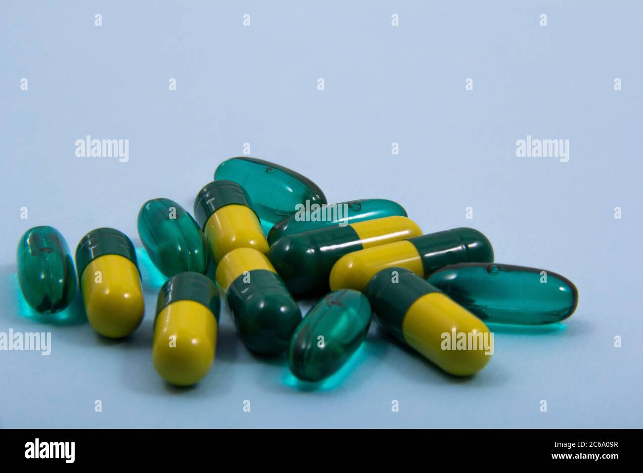 Color capsules out of cover. Color capsules with a simple background ...
