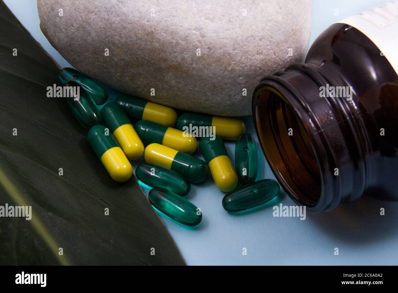 Color capsules out of cover. Color capsules with a simple background ...