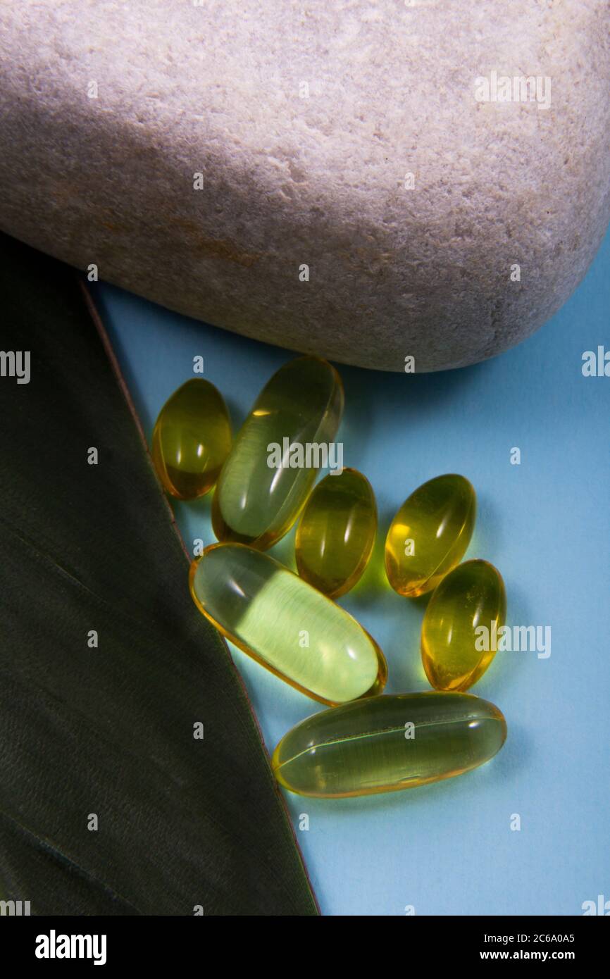 Color capsules out of cover. Color capsules with a simple background ...