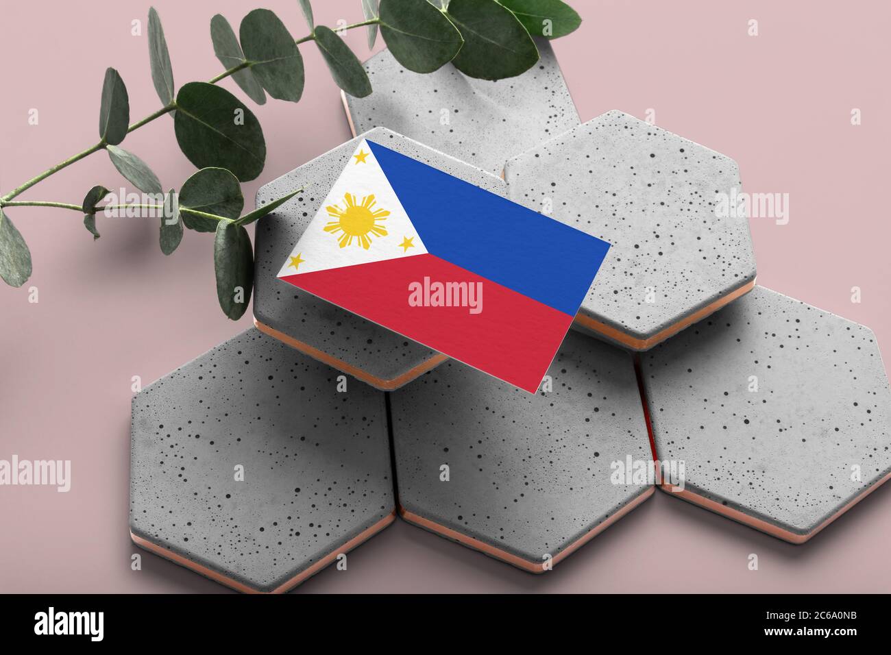 Philippines flag on hexagon stylish stones. Pink copy space background ...