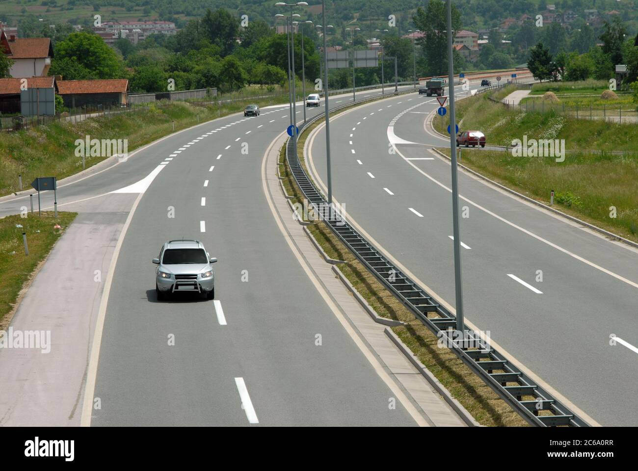 curve on the highway with cars Stock Photo - Alamy