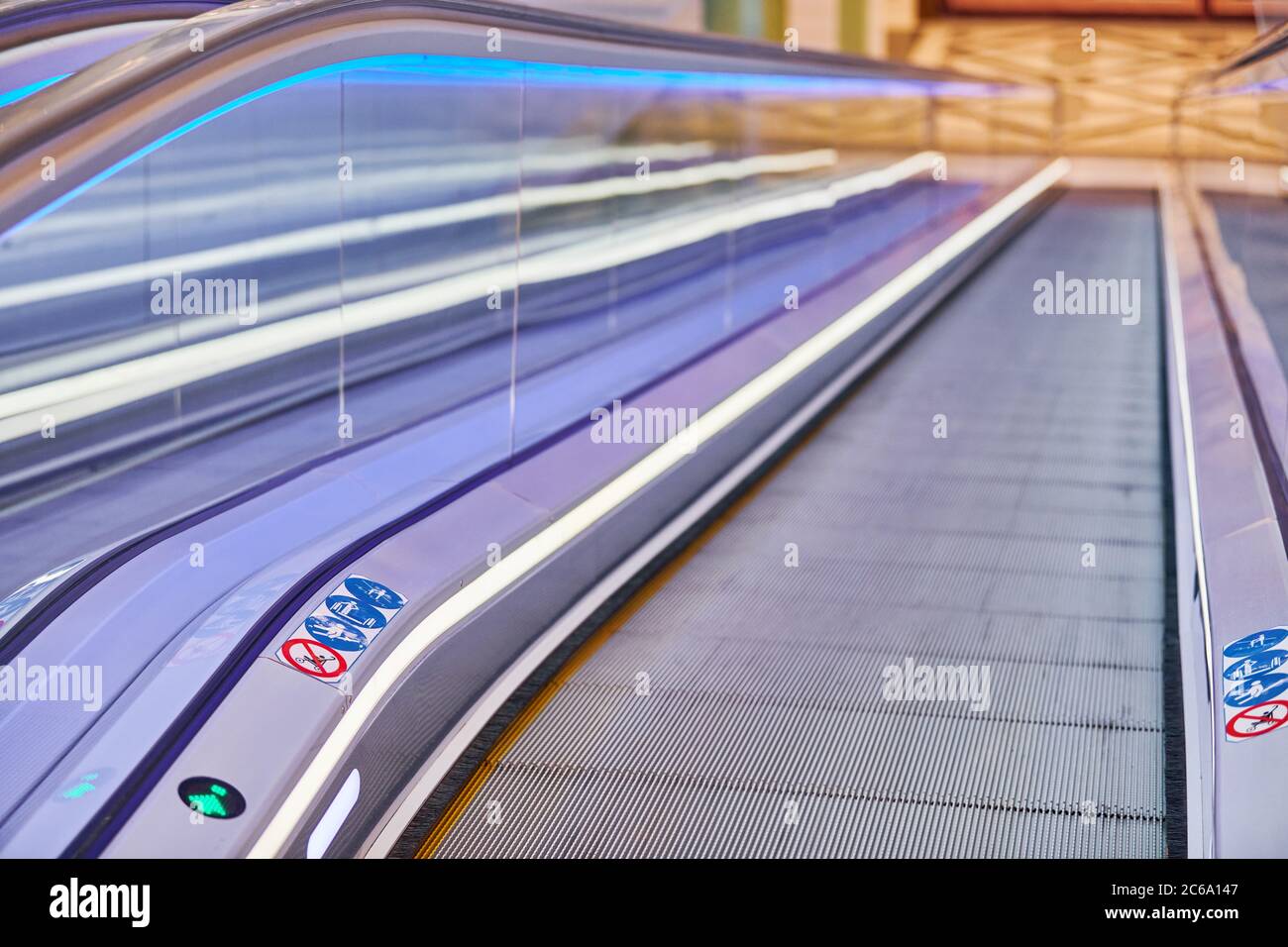 Moving walkway in shopping center. Horizontal slow-moving conveyor ...