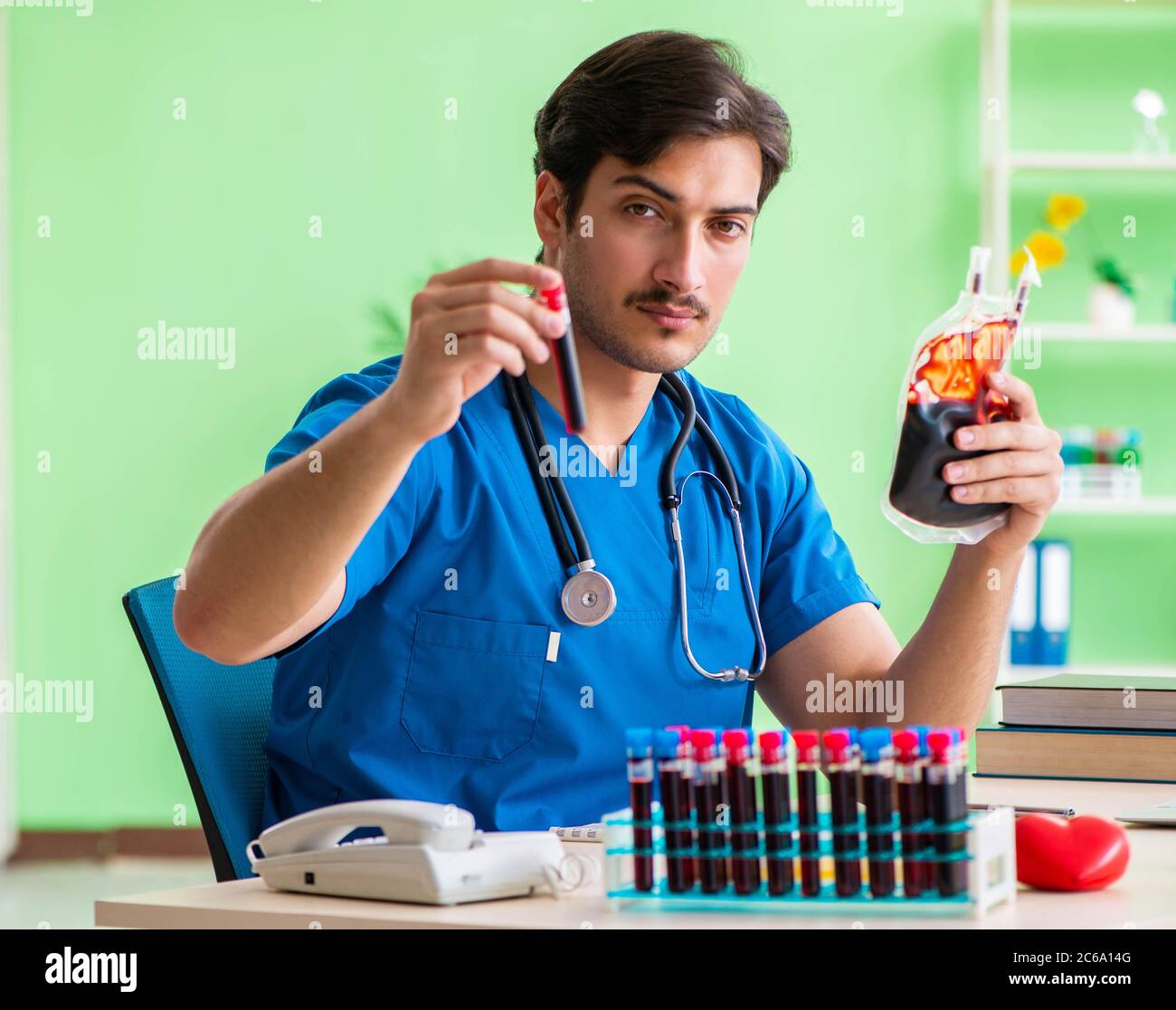 The doctor doing blood analysis in the lab Stock Photo - Alamy