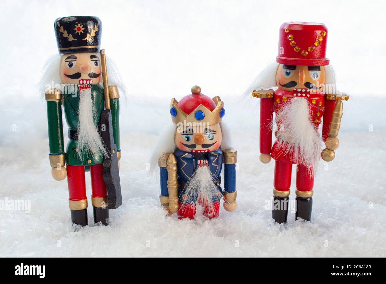 Three Nutcrackers in a Christmas Snow Scene Stock Photo - Alamy
