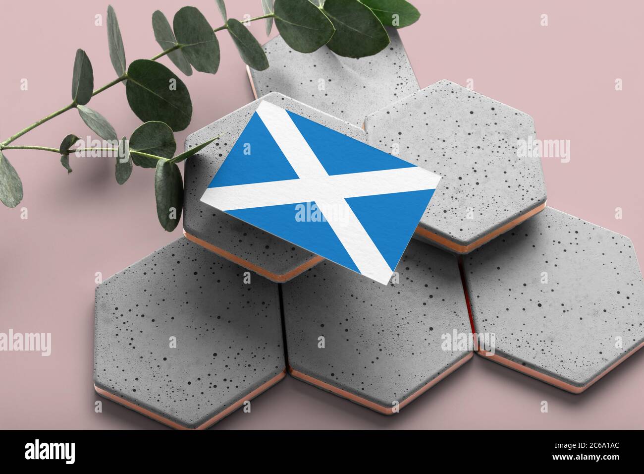 Scotland flag on hexagon stylish stones. Pink copy space background ...