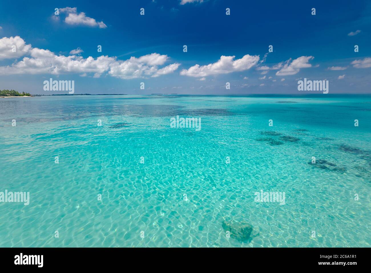 Perfect sky and water of Indian ocean. Turquoise lagoon with coral reef ...