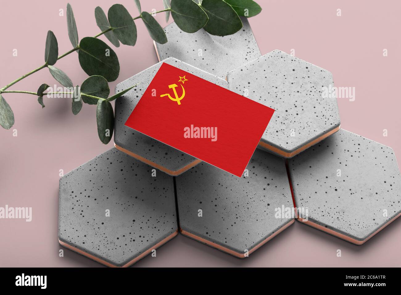 Soviet Union flag on hexagon stylish stones. Pink copy space background ...