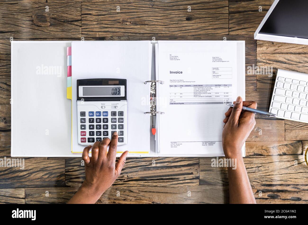 African American Auditor Or Advisor Doing Accounting With Invoice Stock ...