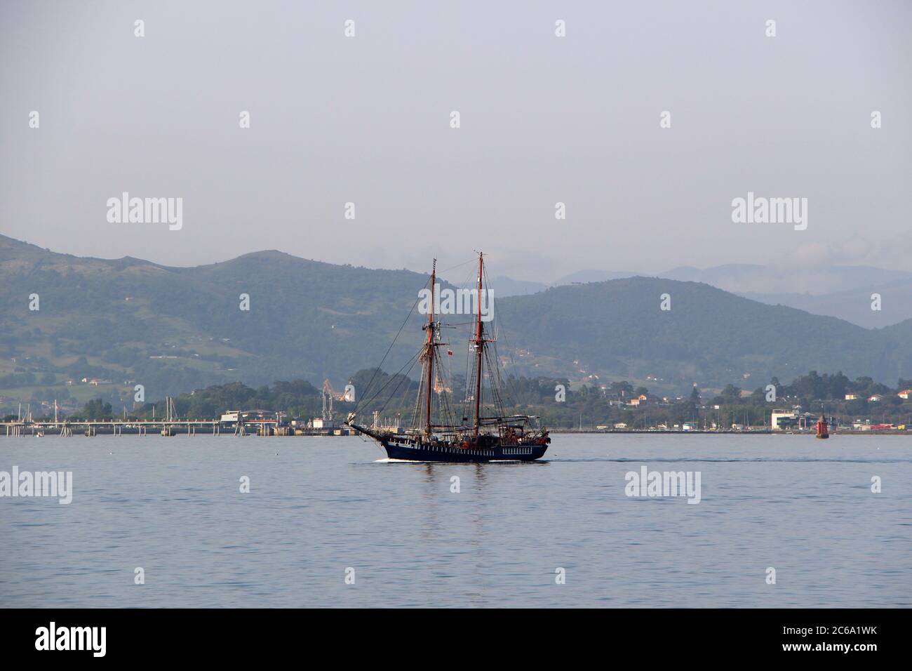 The tall ship Atyla training ship heading out to sea from the bay in ...