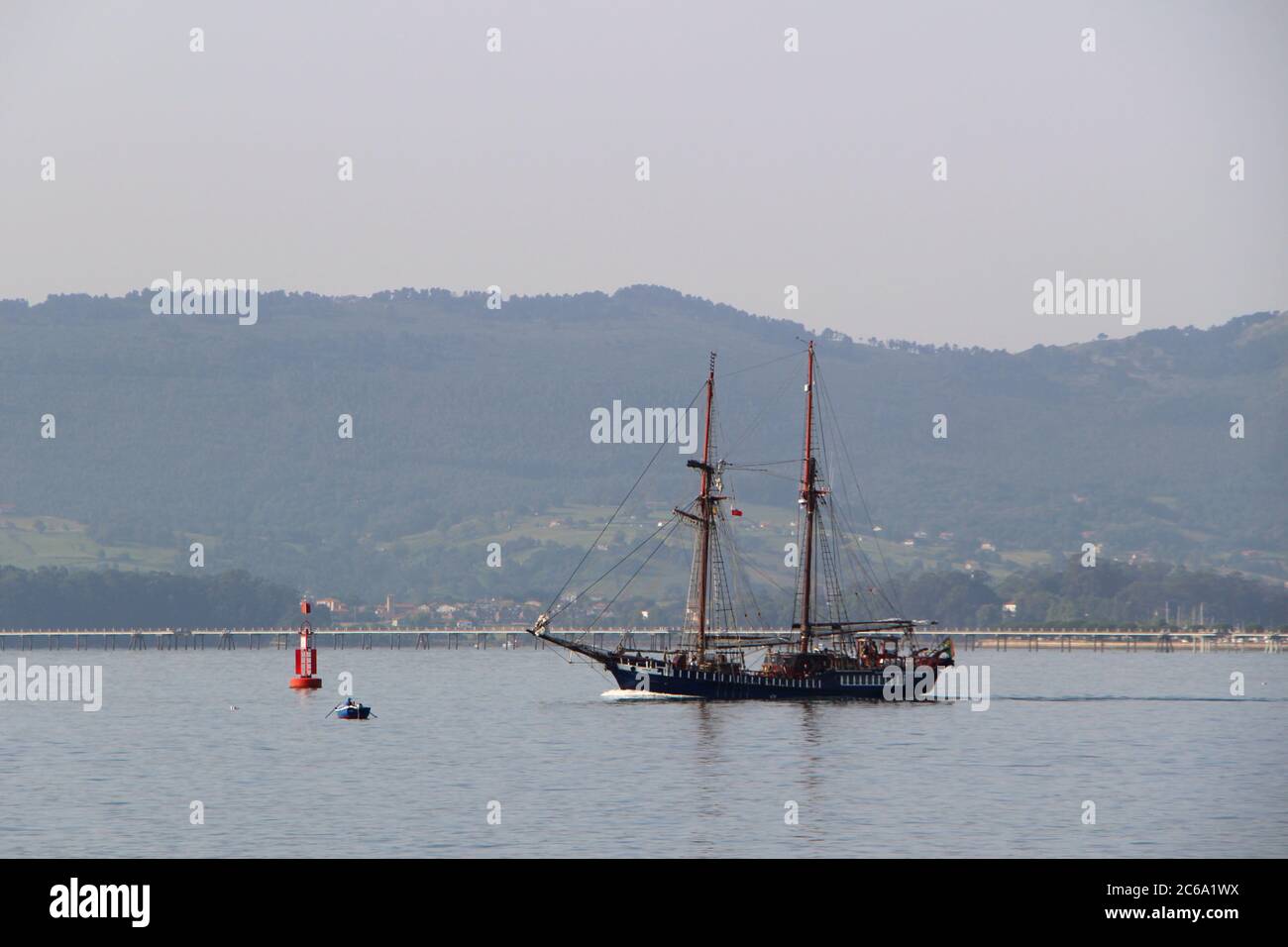 The tall ship Atyla training ship heading out to sea from the bay in ...