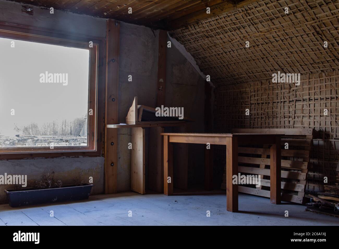 Under construction room table and window view, old walls Stock Photo ...